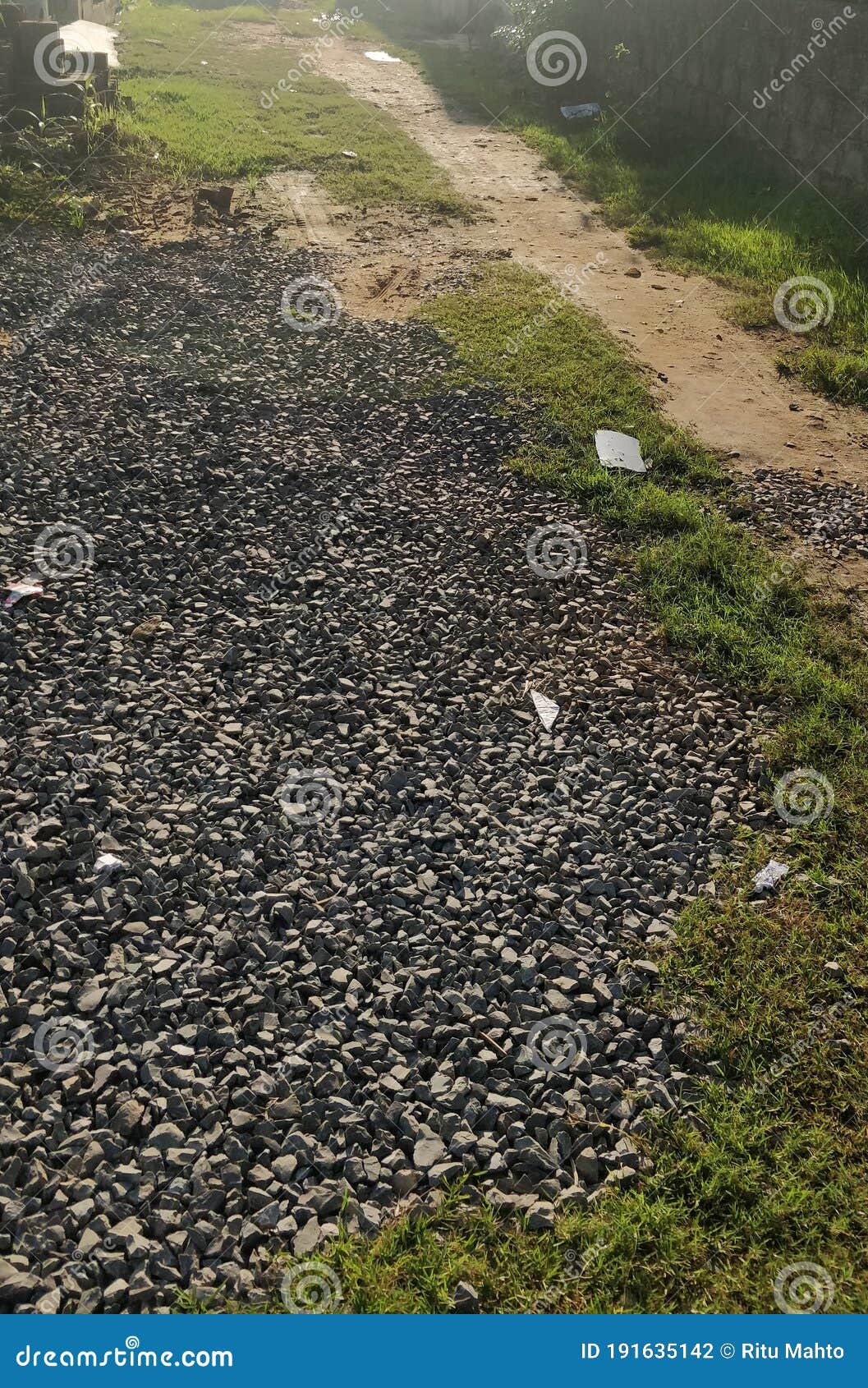 Small Stones Scattered beside a Thin Roadway Stock Photo - Image of ...