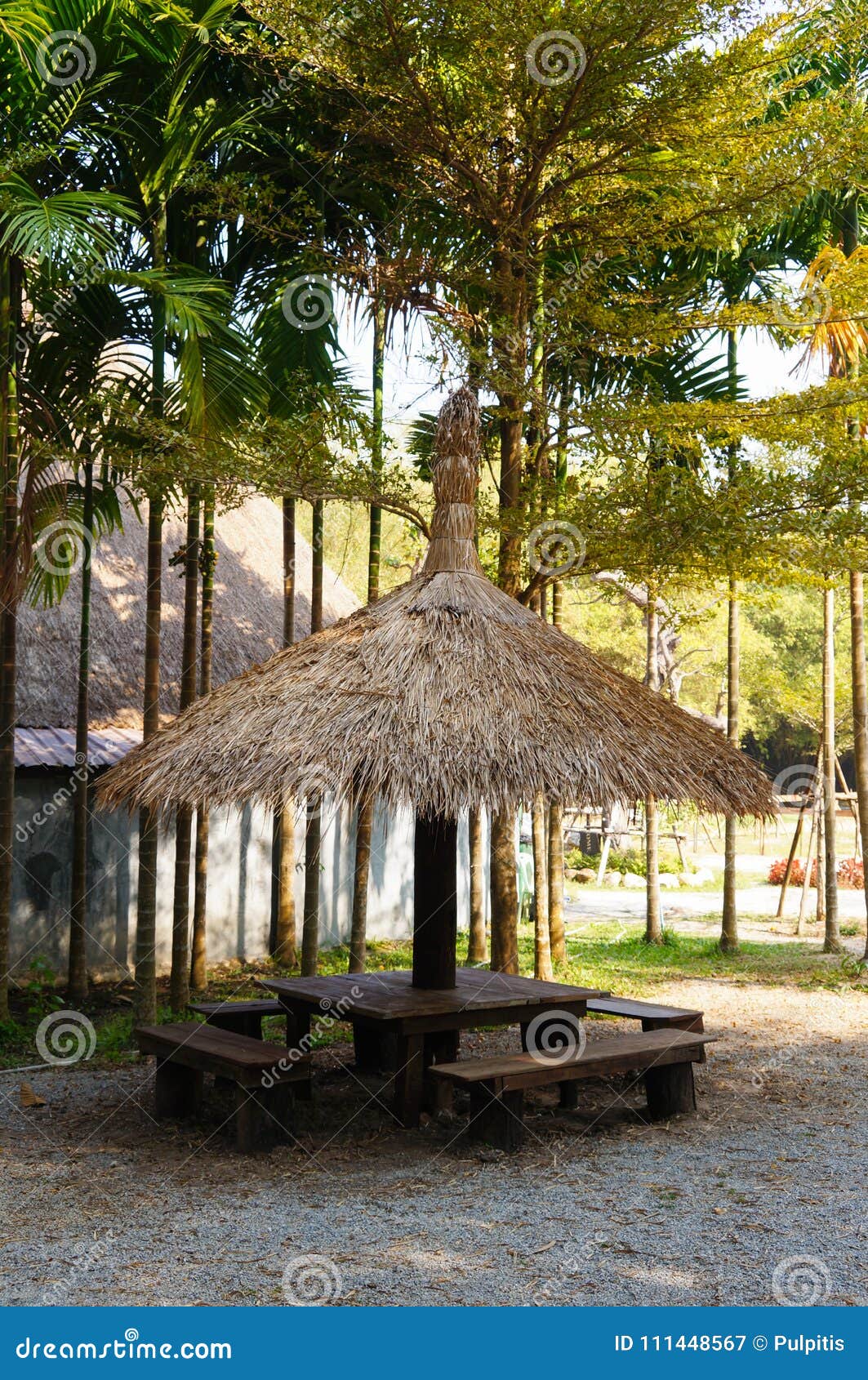 Straw Hat On The Bench Stock Photo | CartoonDealer.com #121752102