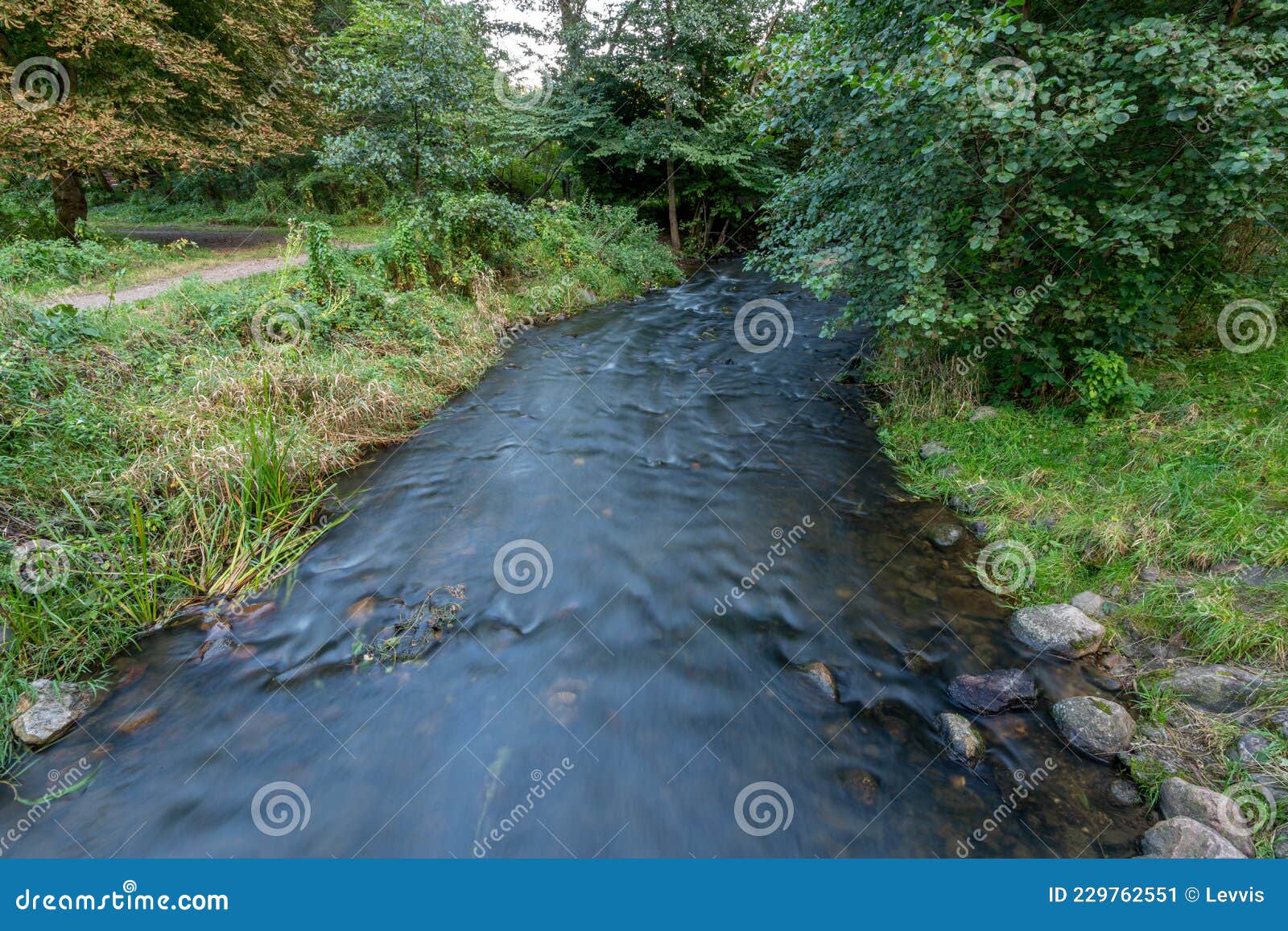 Small Stream, with Blue Water. Long-term Exposure Stock Image - Image ...