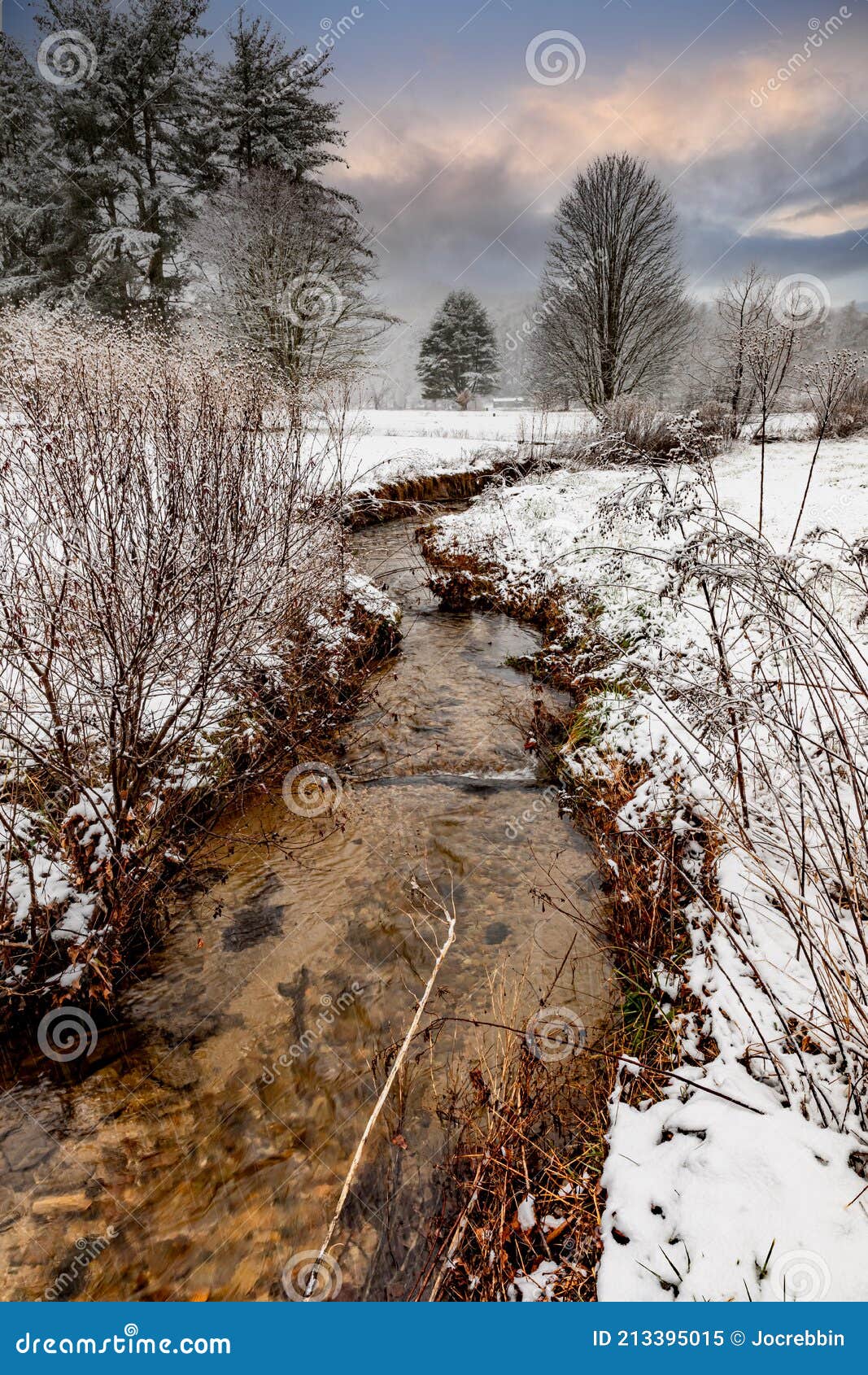 Small Stream Winds through Snow Covered Scene in the Mountains of ...