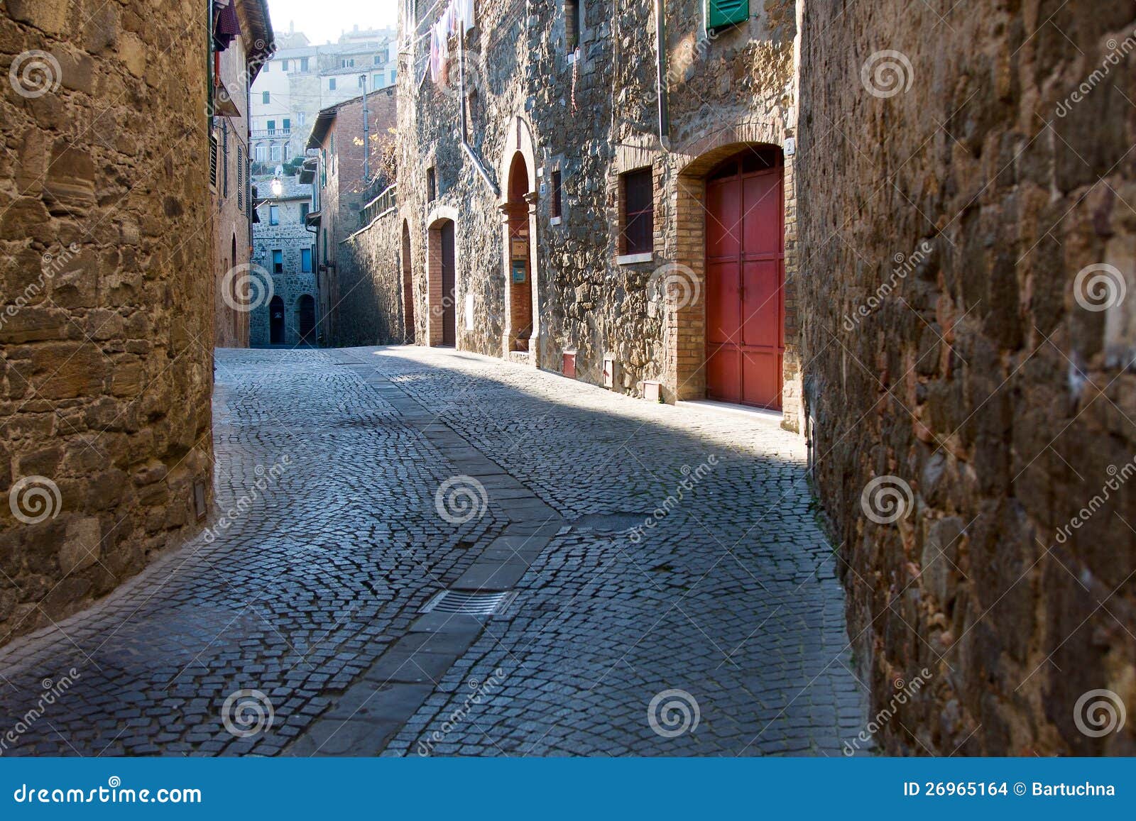 Small street in Montalcino stock photo. Image of building - 26965164