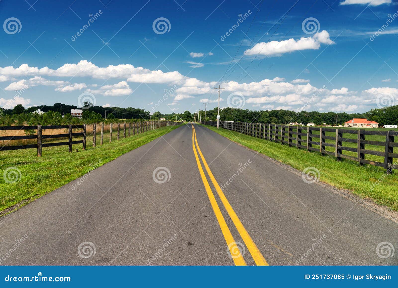 Small Suburban Road in Virginia with Farm Fields and Clouds on the ...