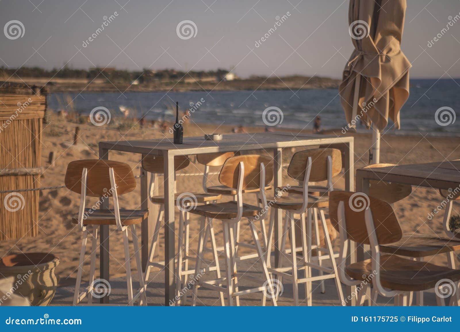 Small Tables in the Beach Bar Stock Image - Image of deep, pouring ...