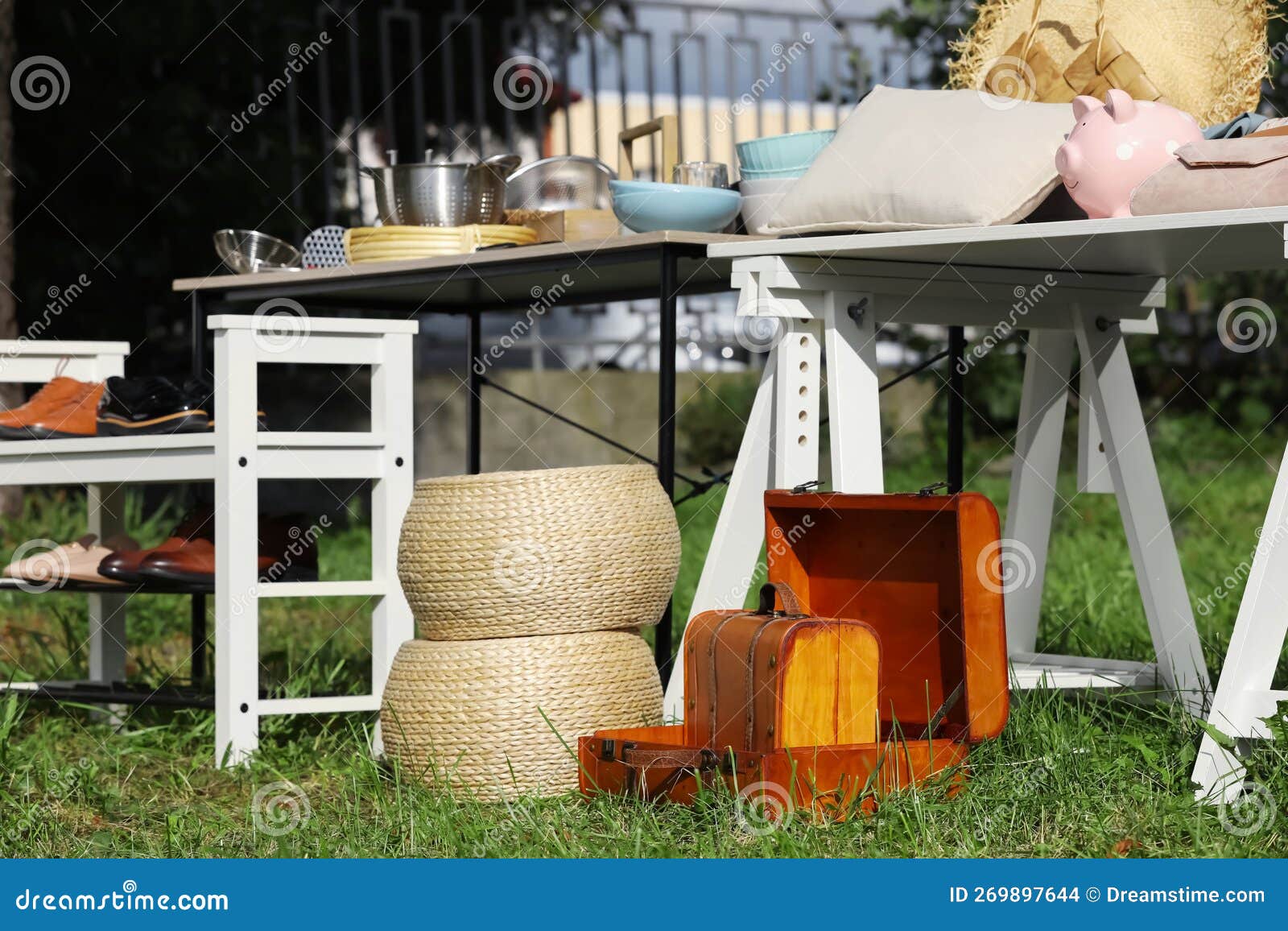 Small Tables with Many Different Items on Garage Sale Outdoors Stock ...