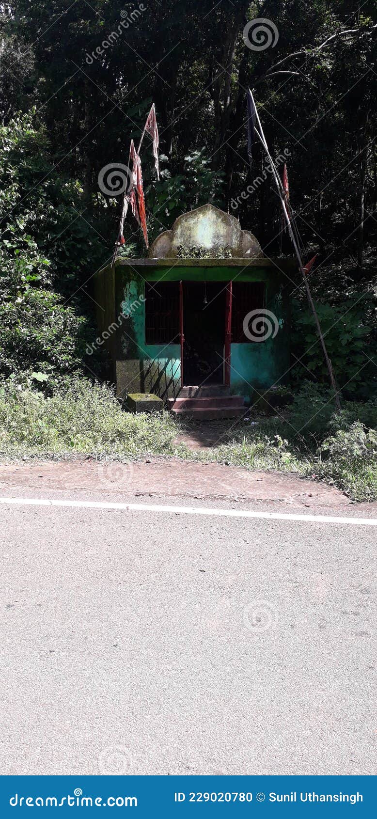 A Small Temple Inside the Forest on Roadside Stock Photo - Image of ...