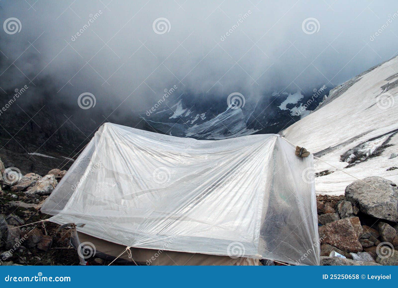 Plastic Tent on Mountainside Stock Photo - Image of cloudy, clouds ...