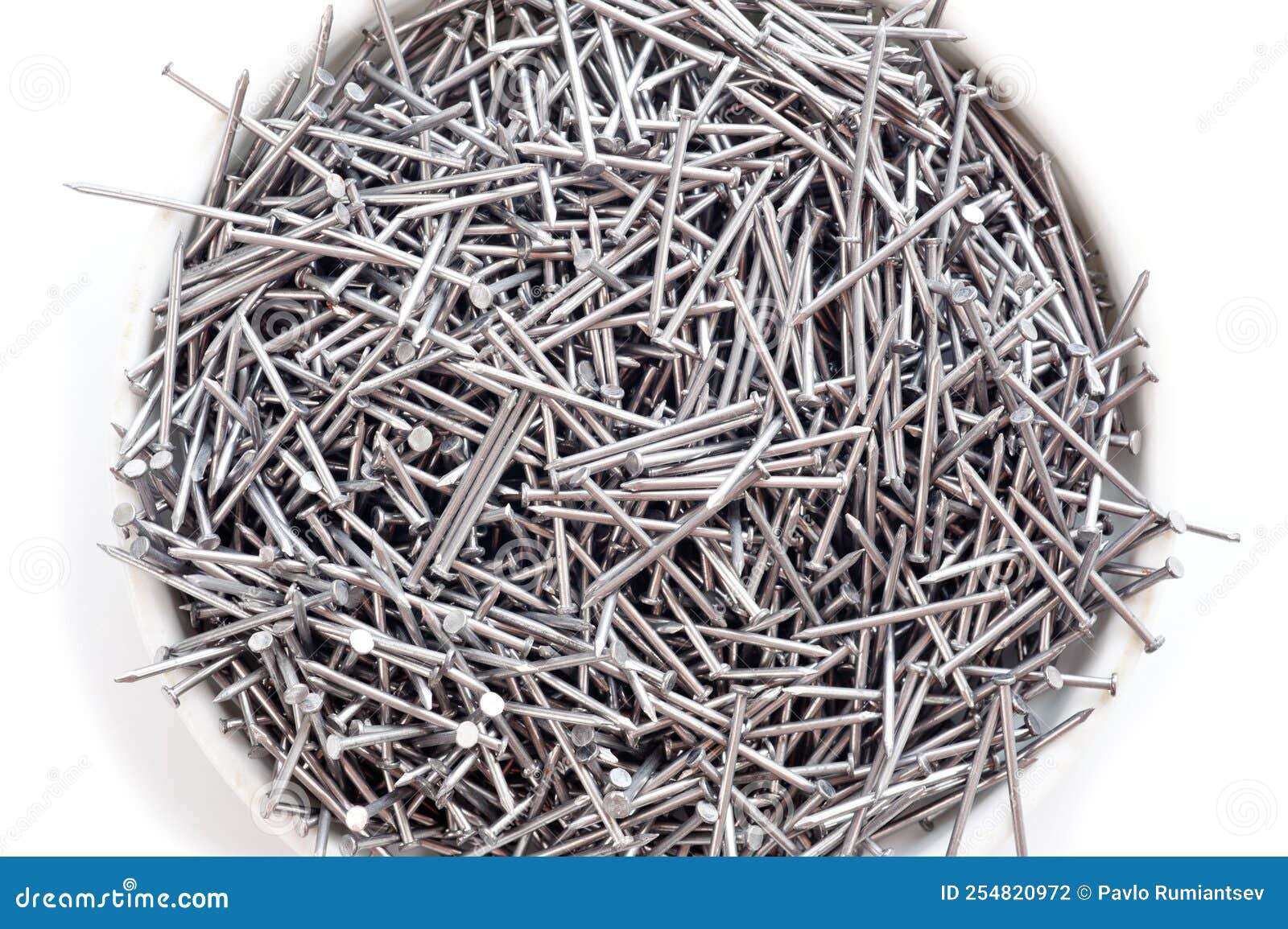 Small Thin Metal Nails, Hardware, Lying in a Round Container Stock ...