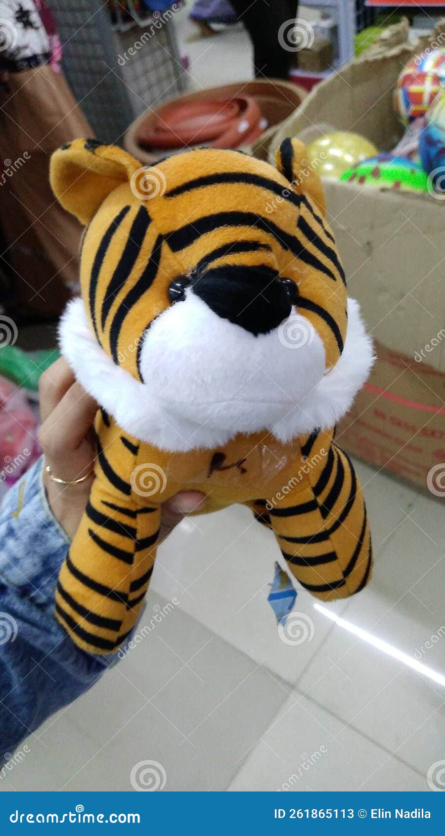 The small tiger doll stock image. Image of crochet, clothing - 261865113
