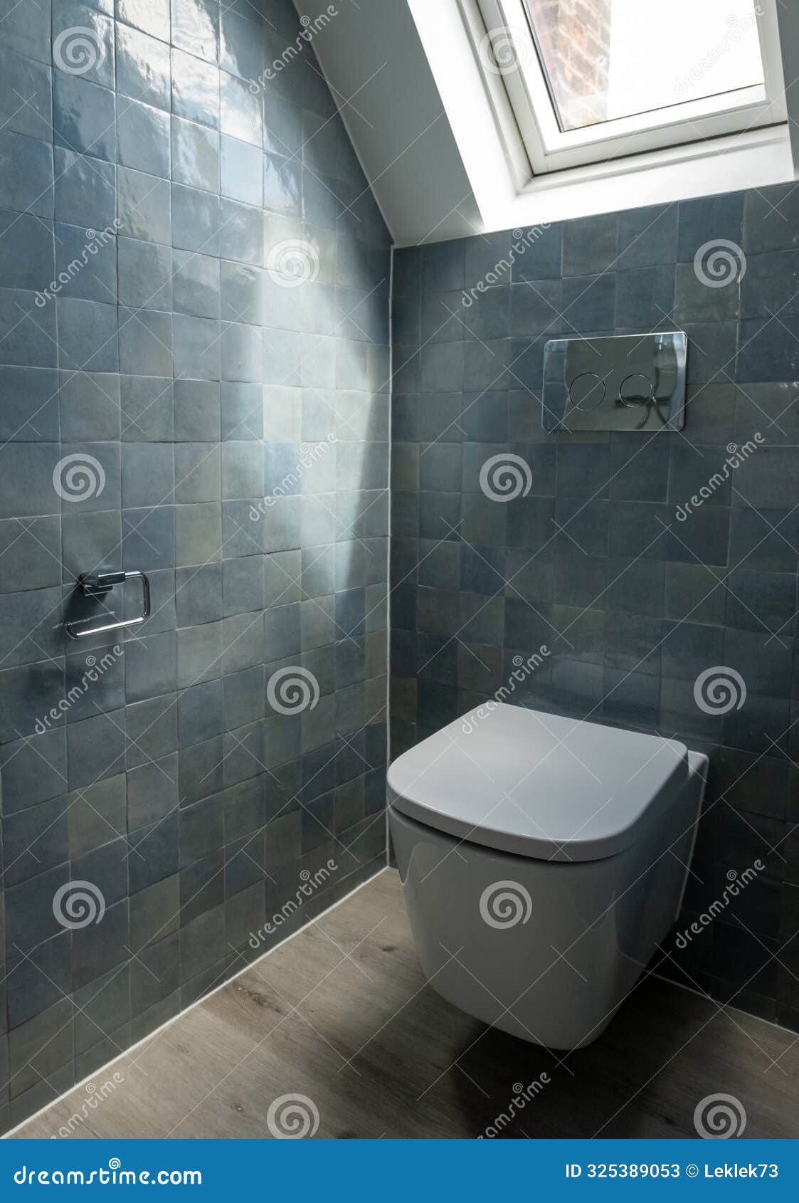 Small Toilet in a Loft Conversion Which Makes Clever Use of Attic Eaves ...