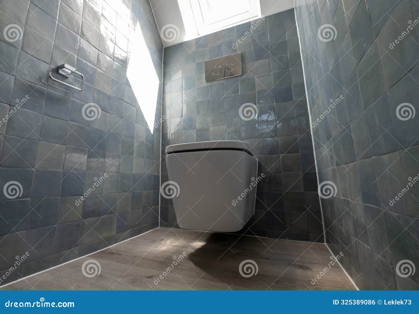 Small Toilet In A Loft Conversion Which Makes Clever Use Of Attic Eaves ...