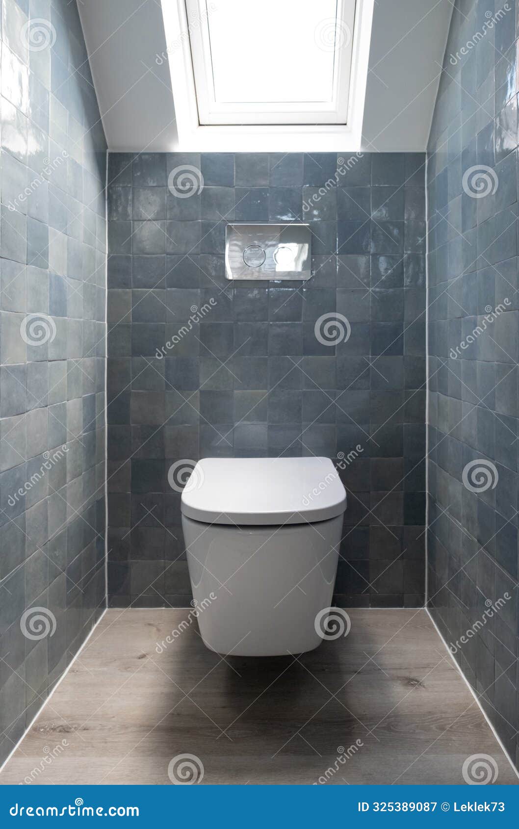 Small Toilet In A Loft Conversion Which Makes Clever Use Of Attic Eaves ...