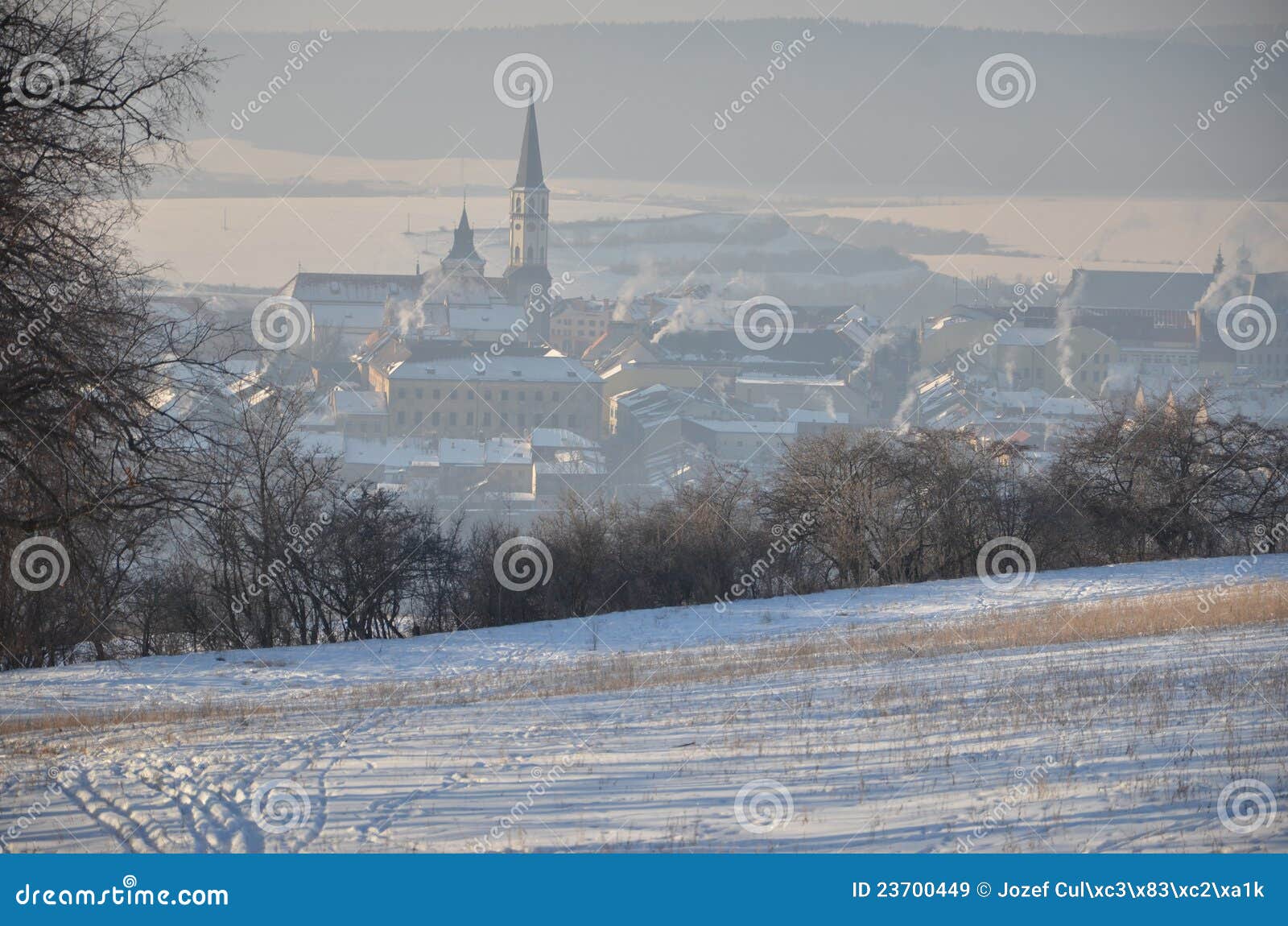 Small town early morning stock image. Image of snow, cross - 23700449