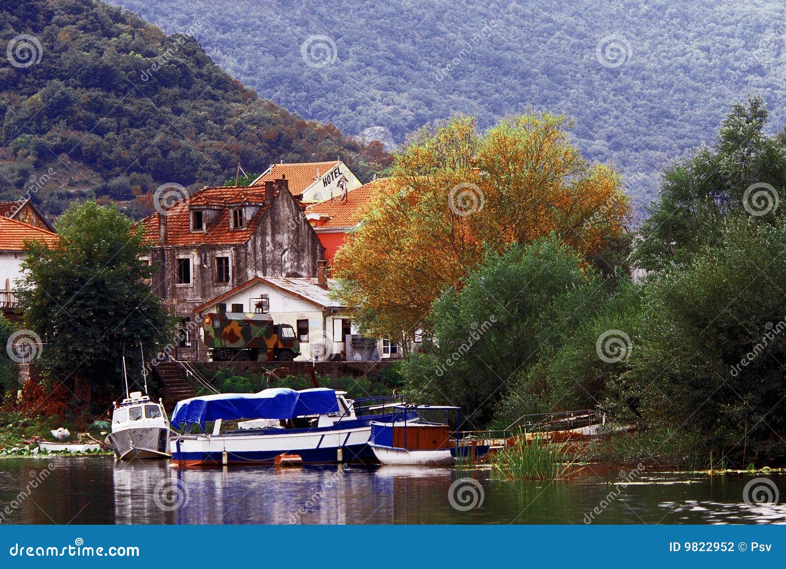 Small town on lake s shore stock photo. Image of mode - 9822952