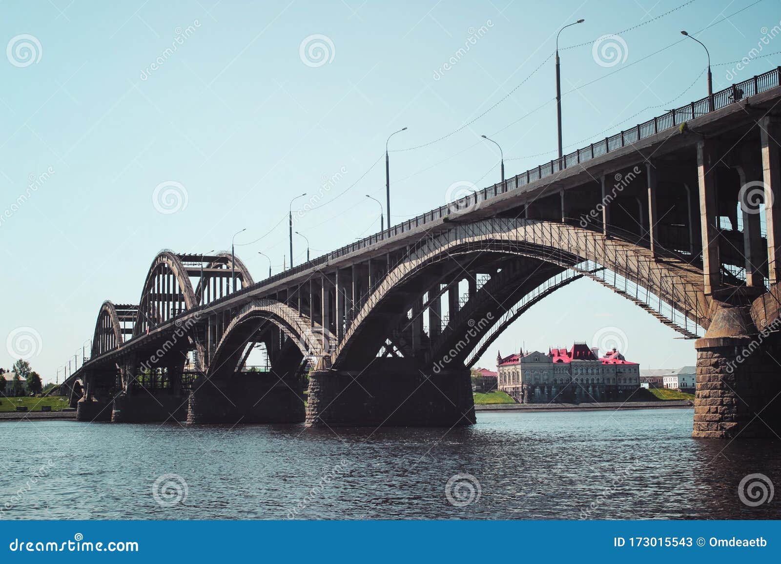 Small Town beside a River. Small Town on River Bank with Bridge Stock ...