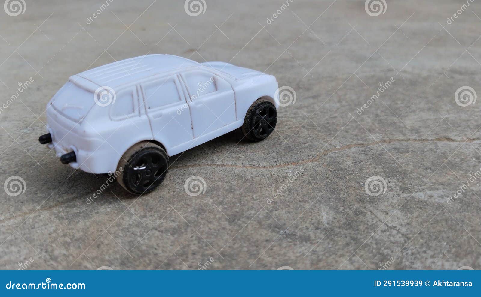 Small toy car on concrete stock image. Image of running - 291539939