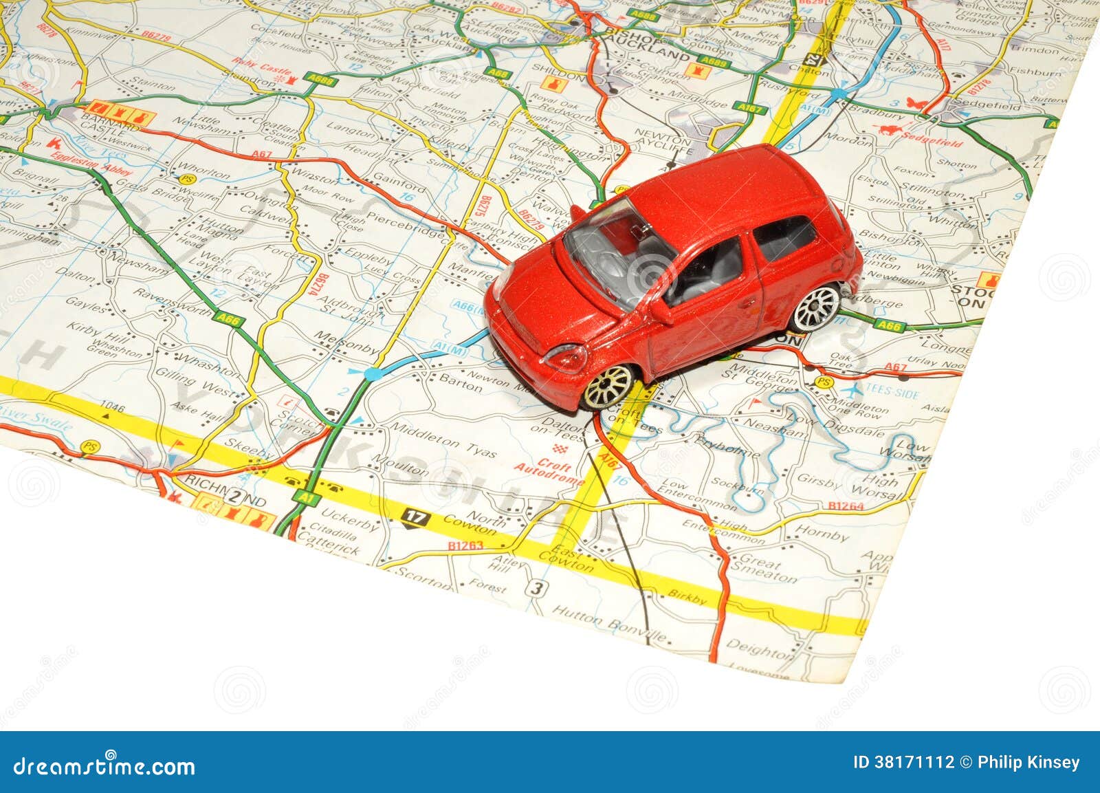 Small Toy Car on Road Map stock photo. Image of commute - 38171112