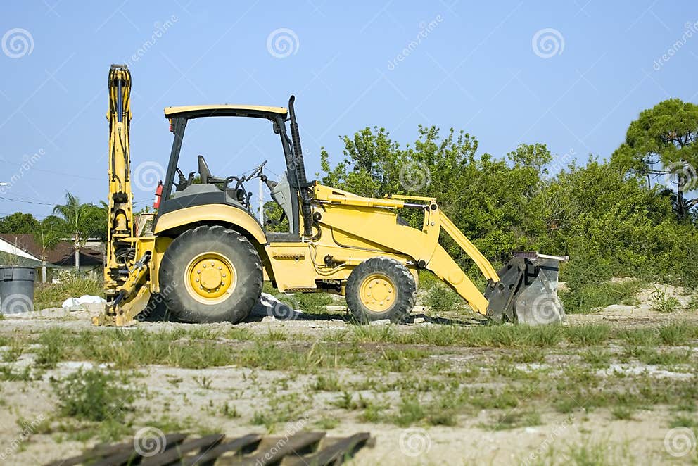 A Small Tractor with Backhoe and Blade Stock Image - Image of excavator ...