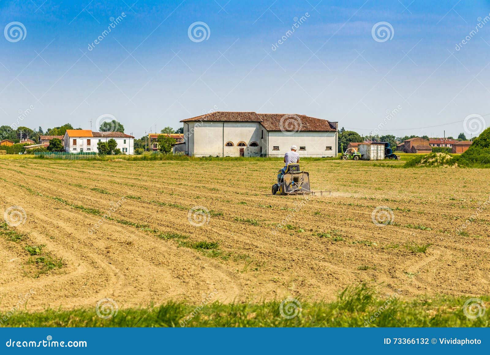 Small Tractor Plowing a Large Field Editorial Photography - Image of ...