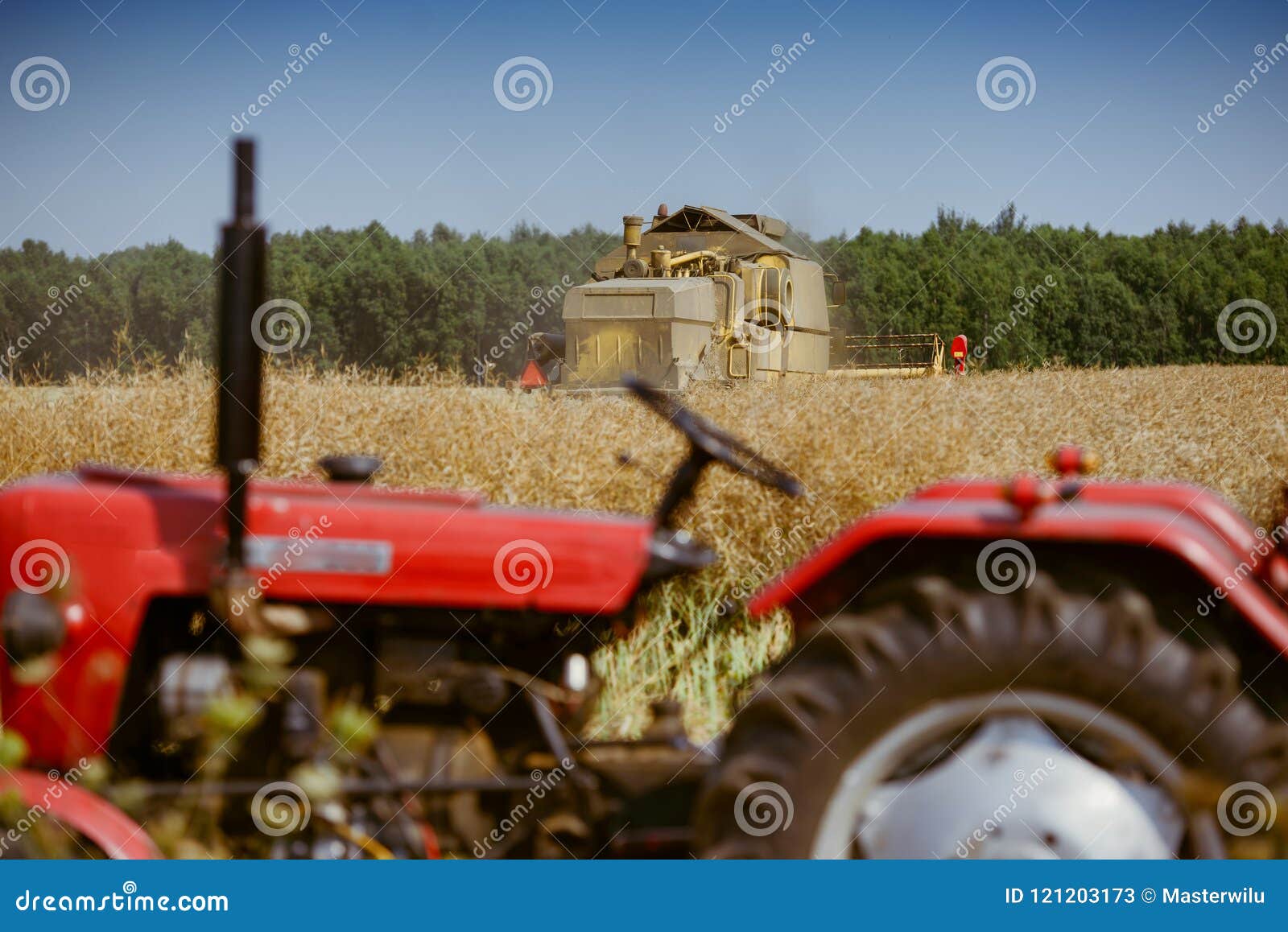 Small tractor with trailer stock image. Image of sunset - 121203173