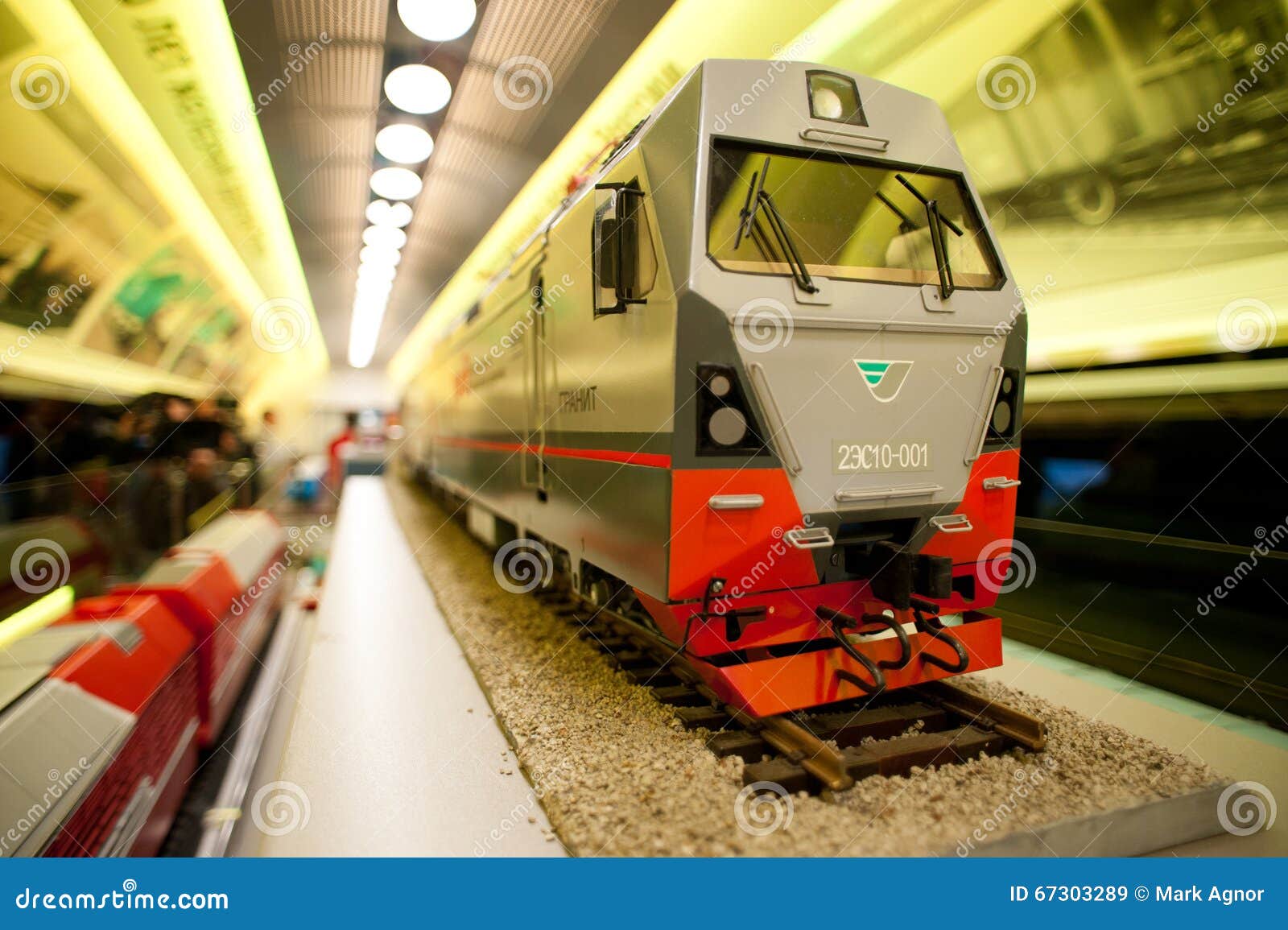 Train Model And Railroad Tracks With Scenery. White Electric Train ...