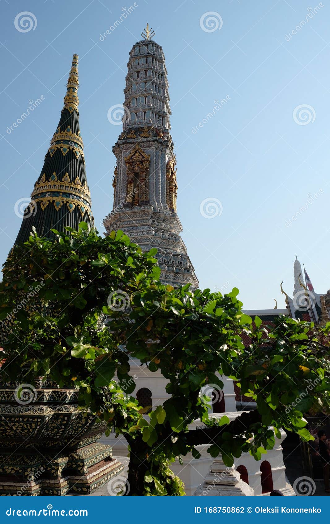 A Small Tree Grows Near the Towers of a Buddhist Temple Stock Photo ...