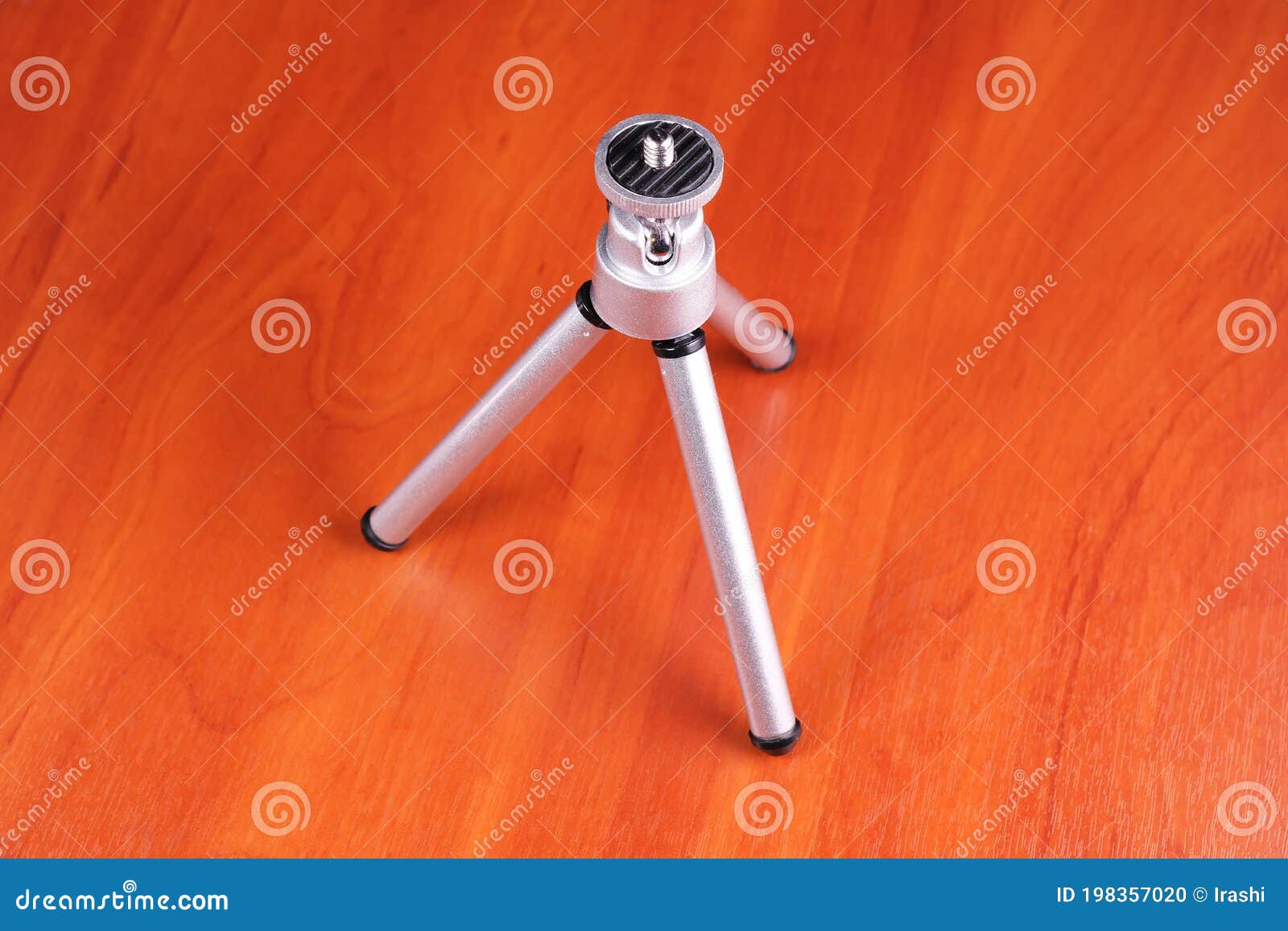 Small tripod on table stock photo. Image of lens, digital - 198357020