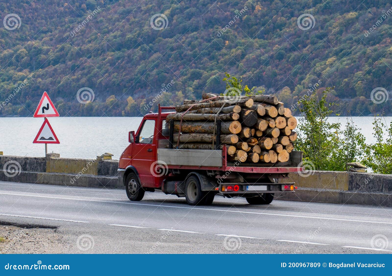 Small Truck Carrying Wood - Logs. Deforestation - Concept Stock Image ...