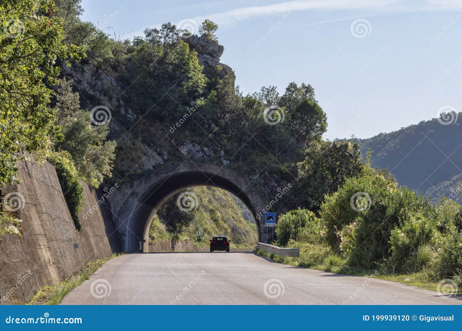 Small tunnel on the road stock photo. Image of path - 199939120