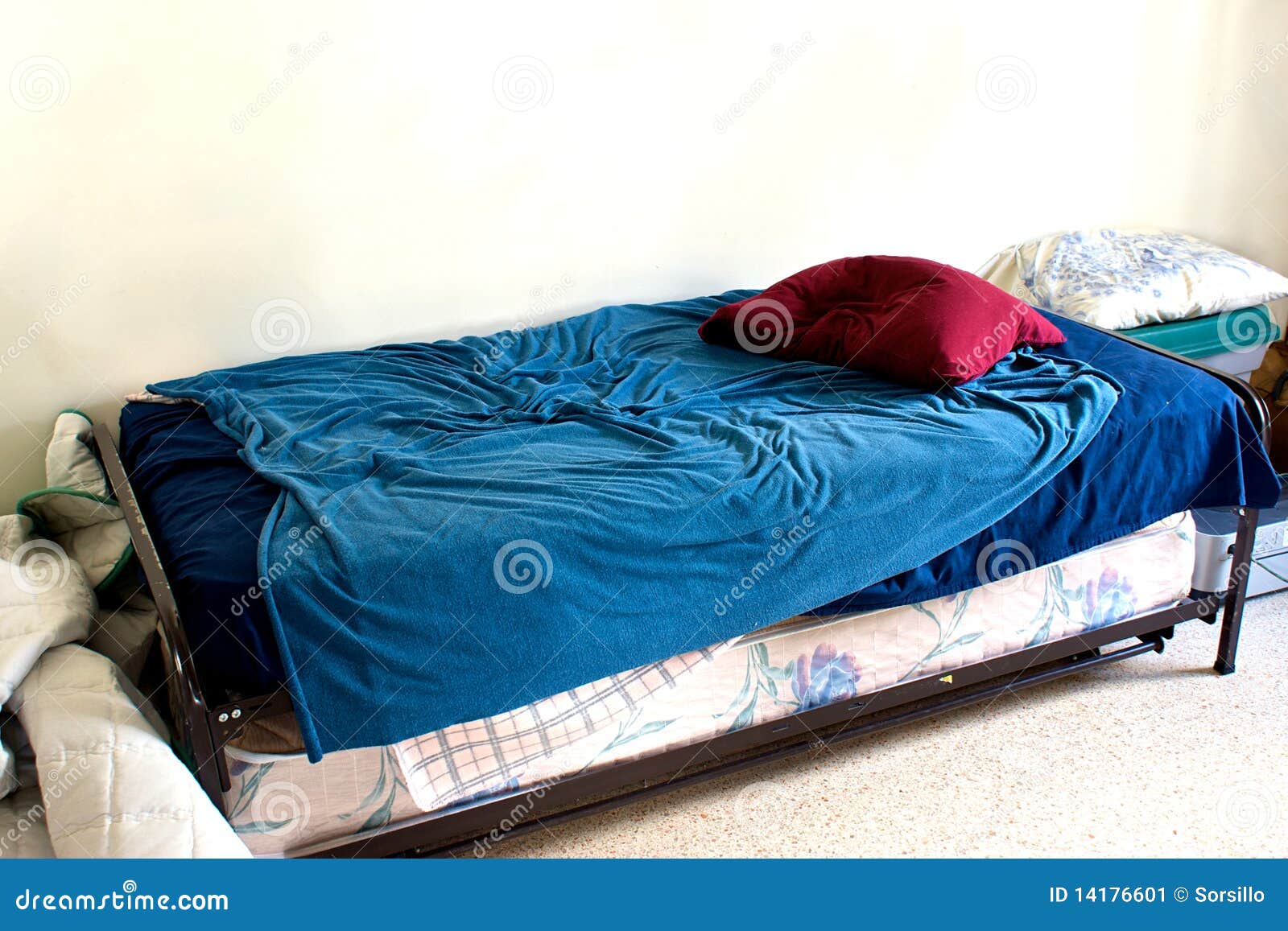 Small Used Bed in White Room Stock Image - Image of wrinkled, trundle ...