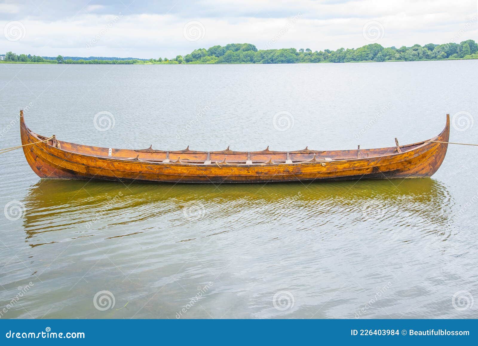 View of Small Viking Boat Karve by the River Shore Stock Photo - Image ...