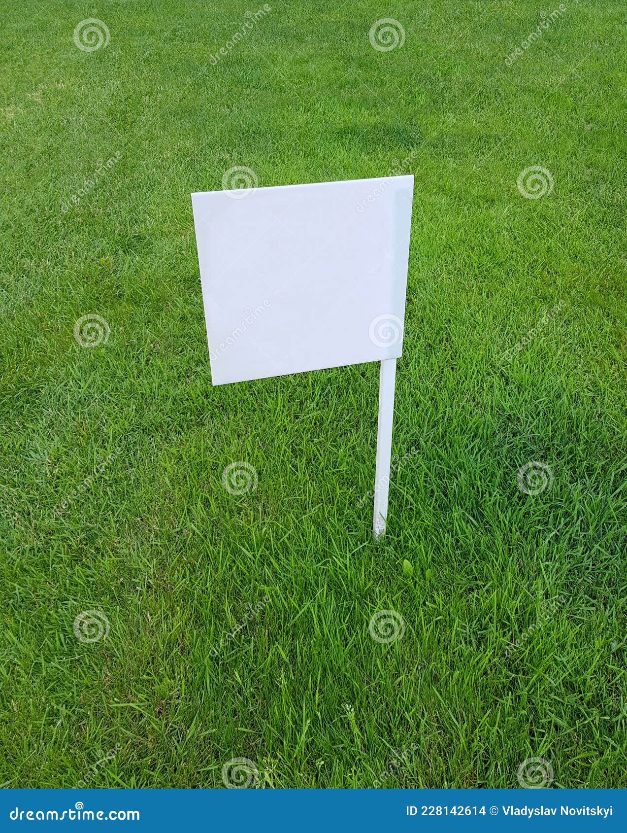 Small Warning Sign on the Background of Green Grass in the Park Stock ...