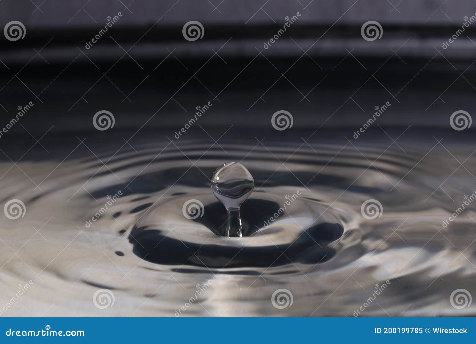 Small Water Drop Falling on Water Surface Stock Image - Image of ...