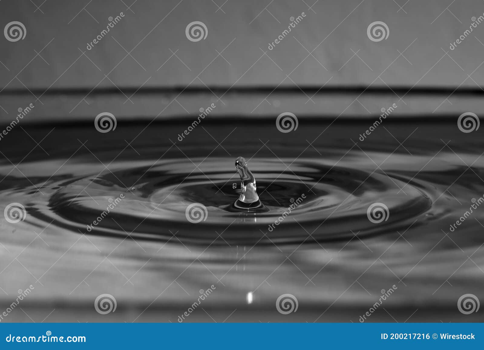 Small Water Drop Falling on Water Surface Stock Photo - Image of ...