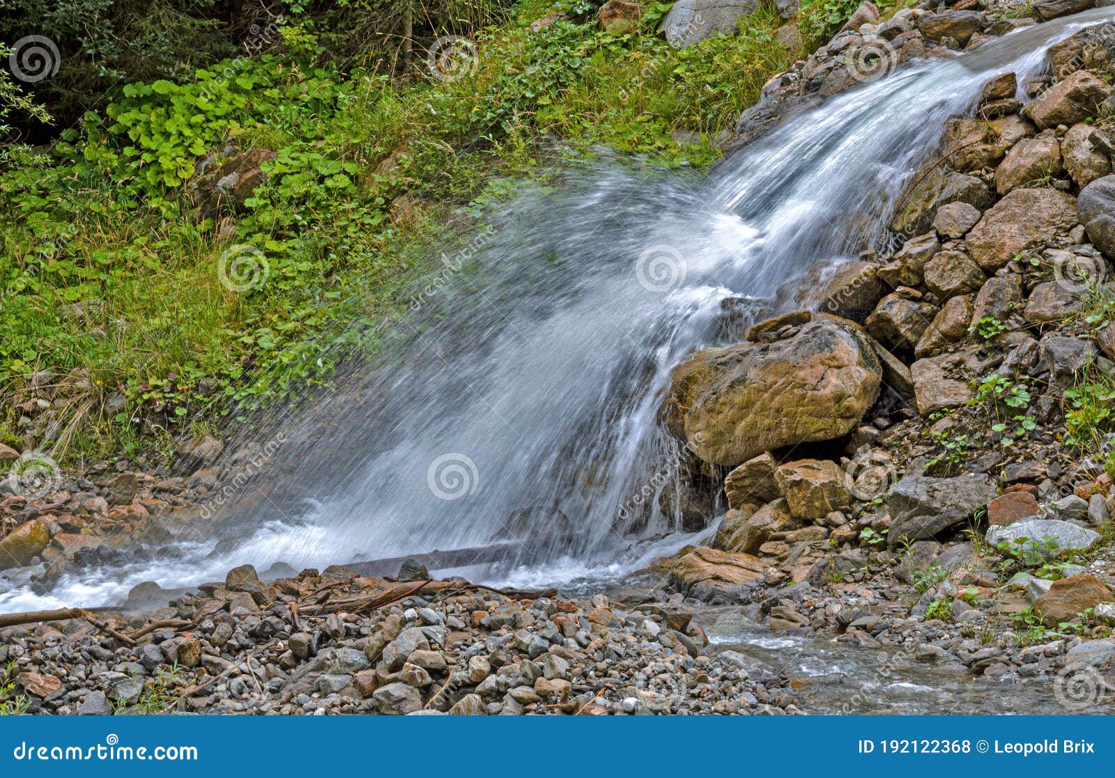 Small water fall of a well stock photo. Image of spring - 192122368
