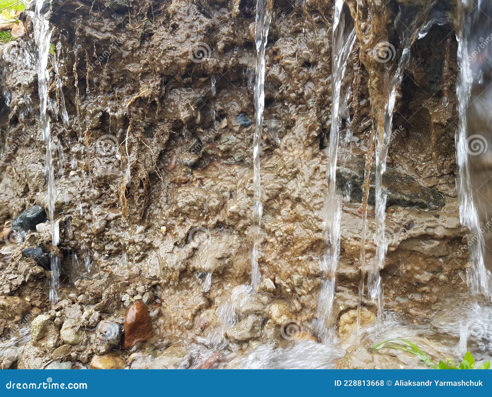 A Small Waterfall. Flowing Water Erodes the Soil Stock Photo - Image of ...