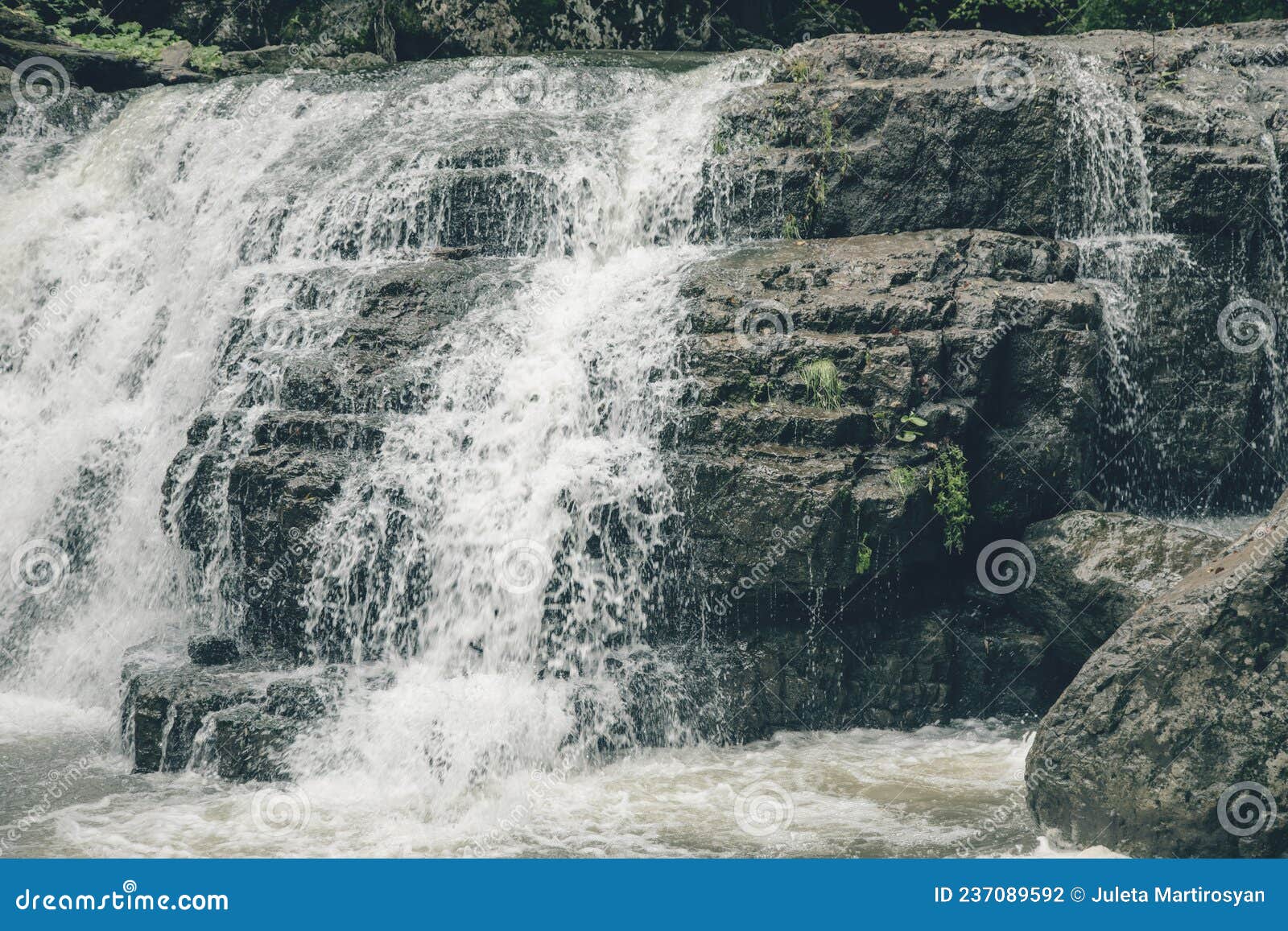 A Small Waterfall Flows into the River Stock Photo - Image of park ...