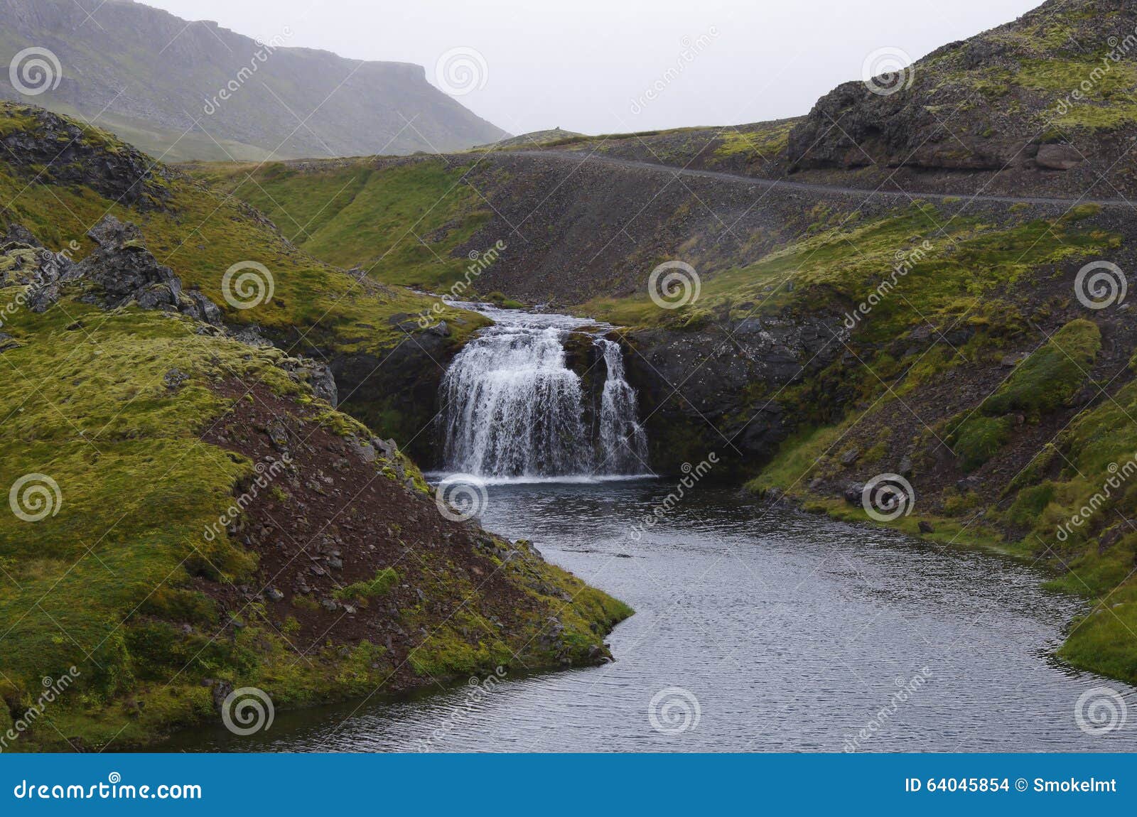 Small waterfall in Iceland stock photo. Image of skogafoss - 64045854