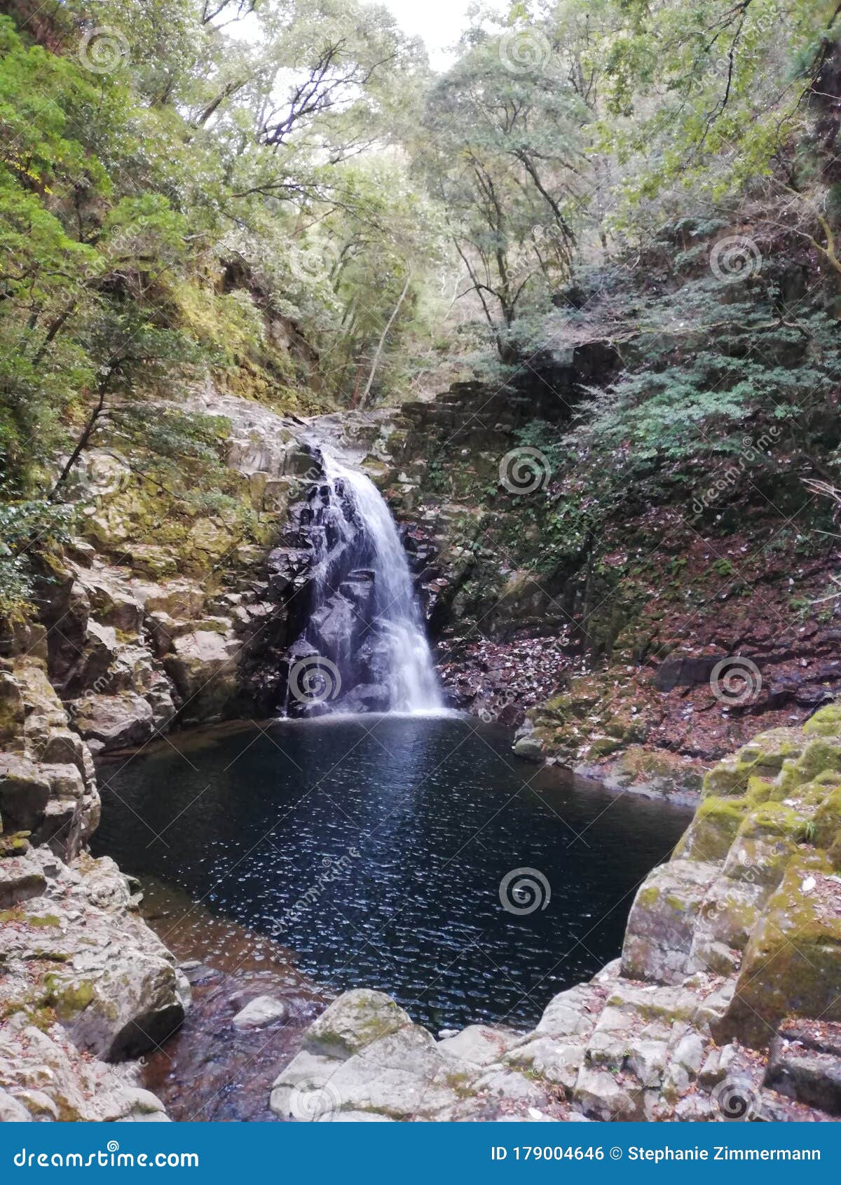 Small Waterfall into Lake stock photo. Image of waterfall - 179004646