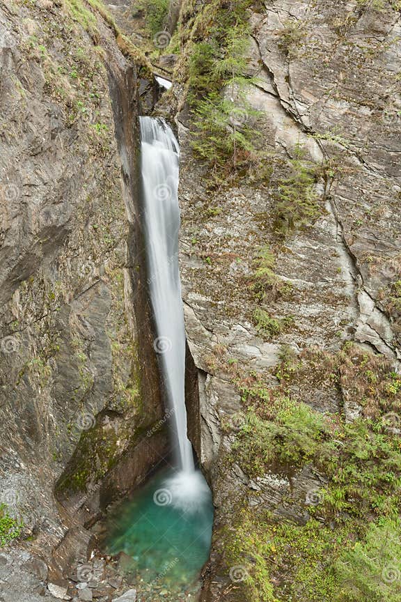 Small Waterfall and Lake among the Rock Stock Image - Image of mountain ...