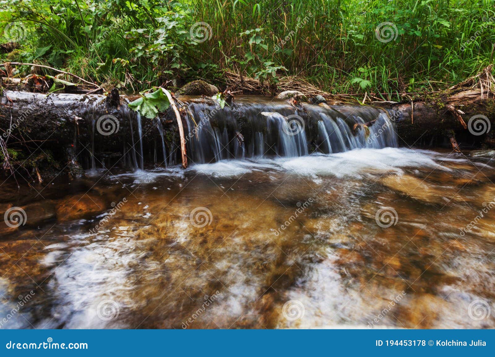 A Small Waterfall on a Mountain River with Crystal Clear Water Stock ...