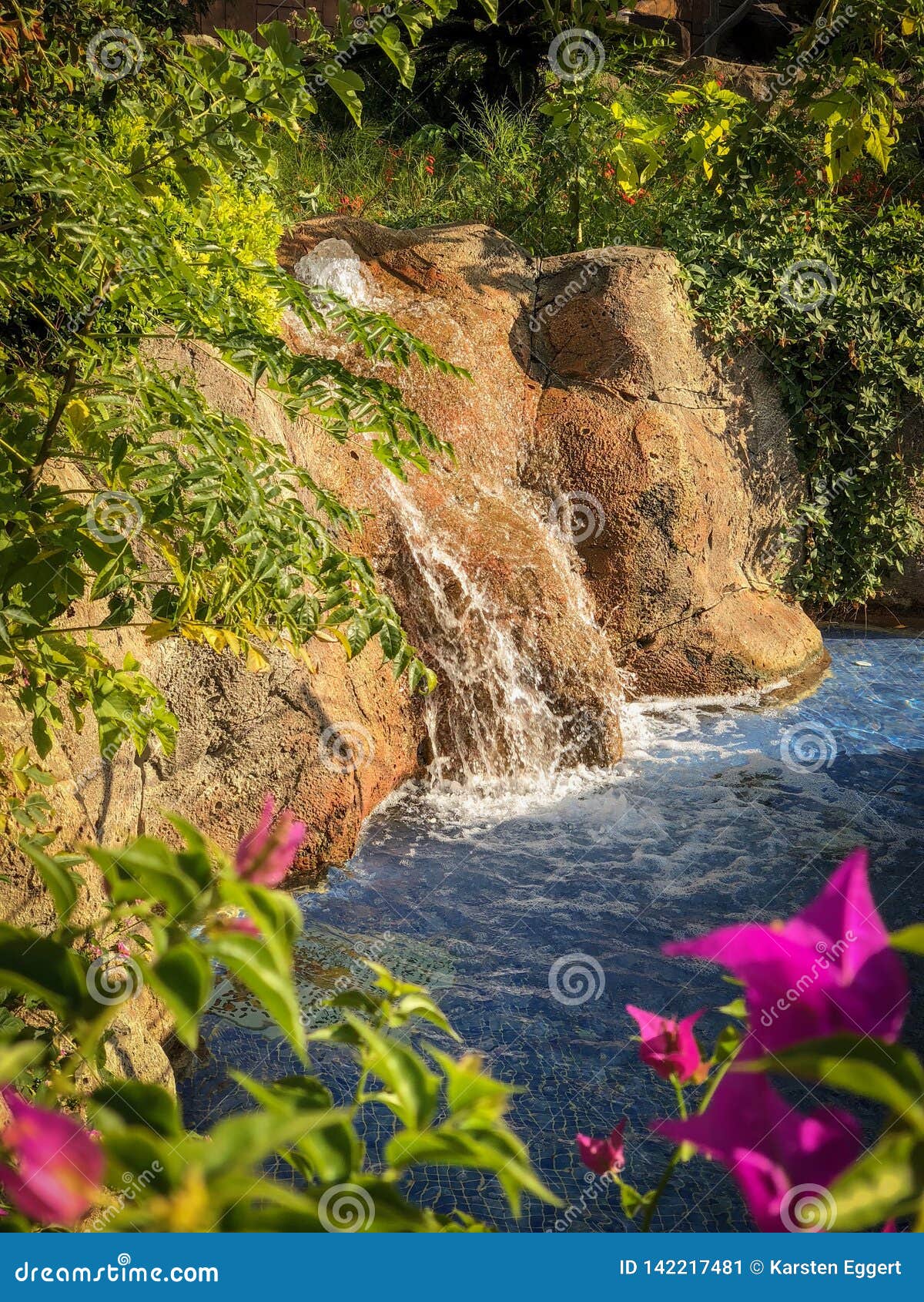 Small waterfall in a park stock image. Image of cascade - 142217481