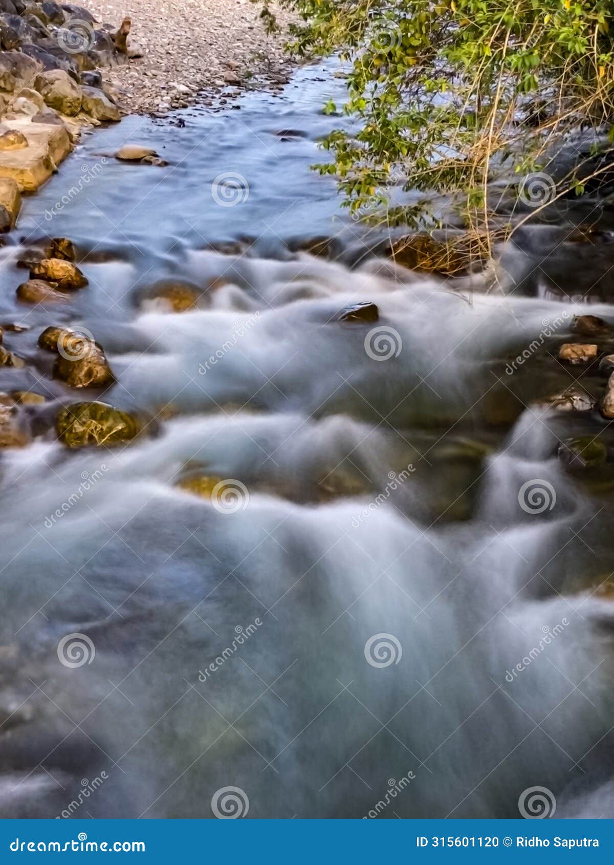 A Small Waterfall in a River with a Fairly Fast Flow Stock Photo ...