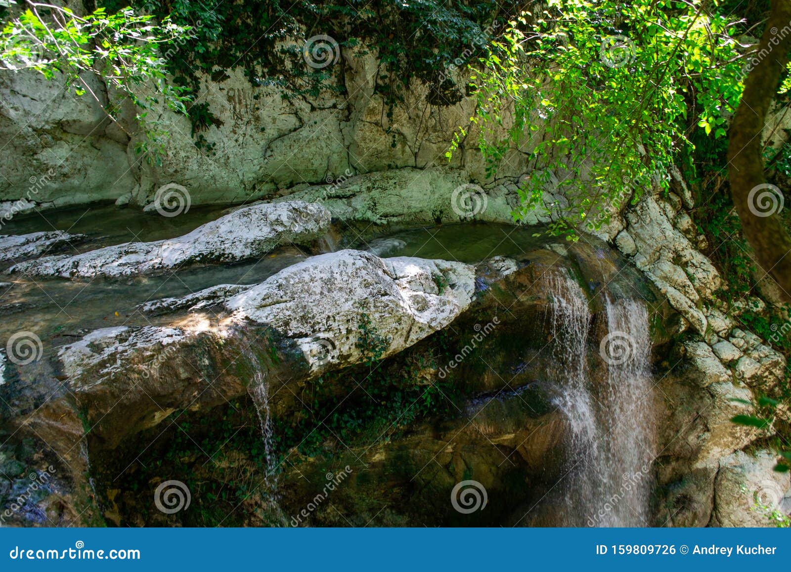Small Waterfall from the Rock Cliff in the National Park Stock Photo ...