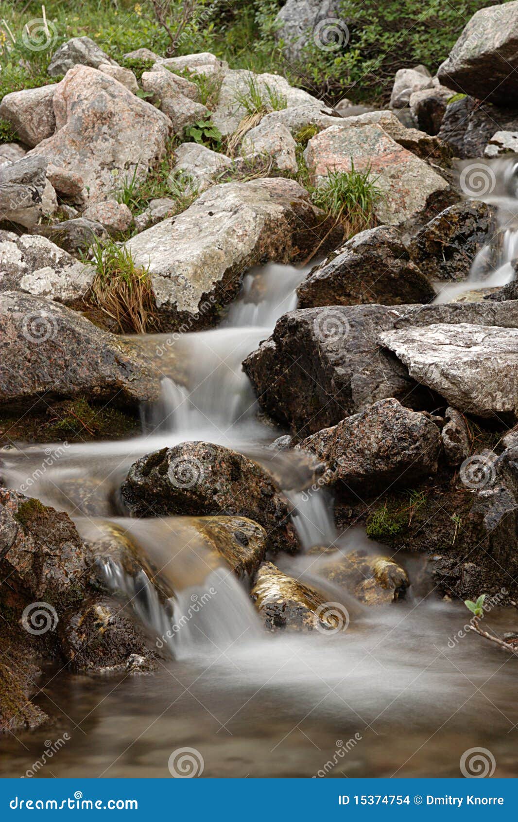 Small waterfall in stones stock photo. Image of woods - 15374754