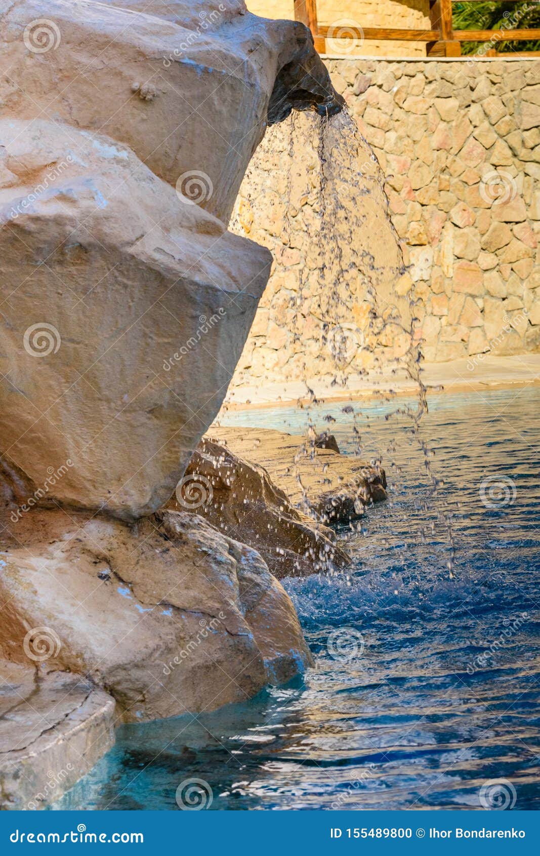 Small Waterfall with Turquoise Water in the Hotel Pool Stock Photo ...