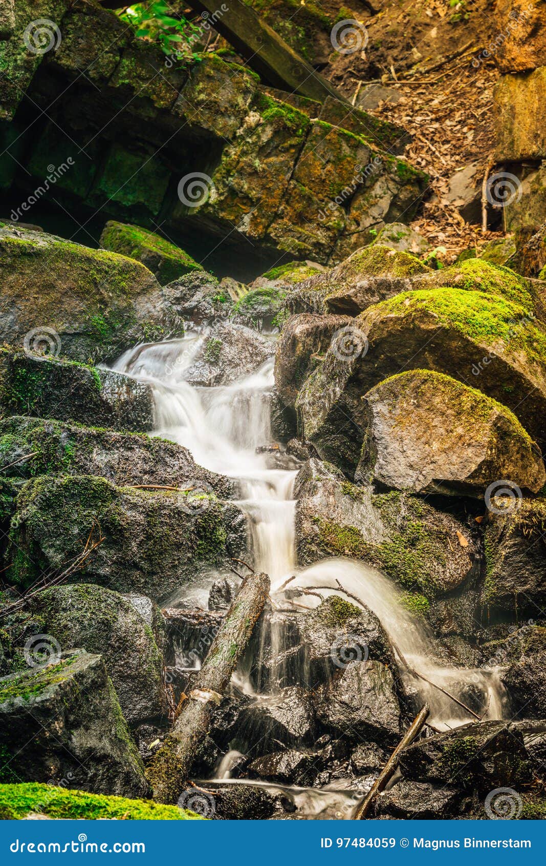 Small Waterfall with Water Running through Rocks Stock Image - Image of ...