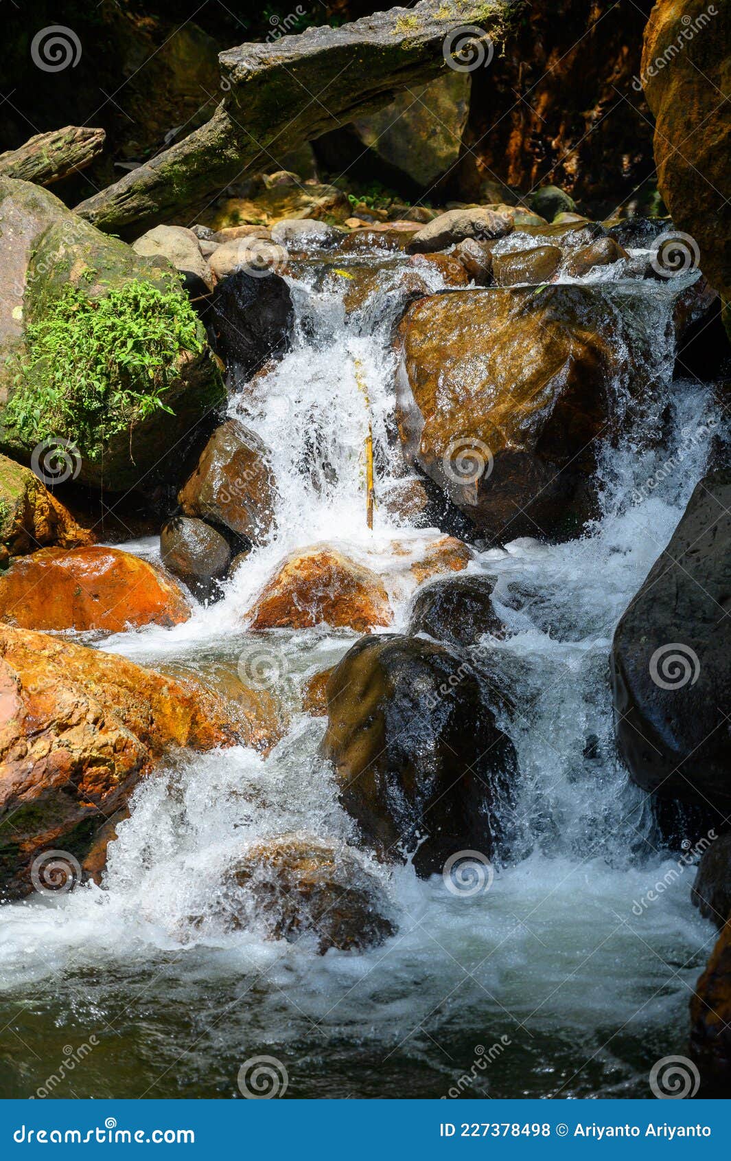 Clear Water from a Waterfall, Running through Many Stones, through ...