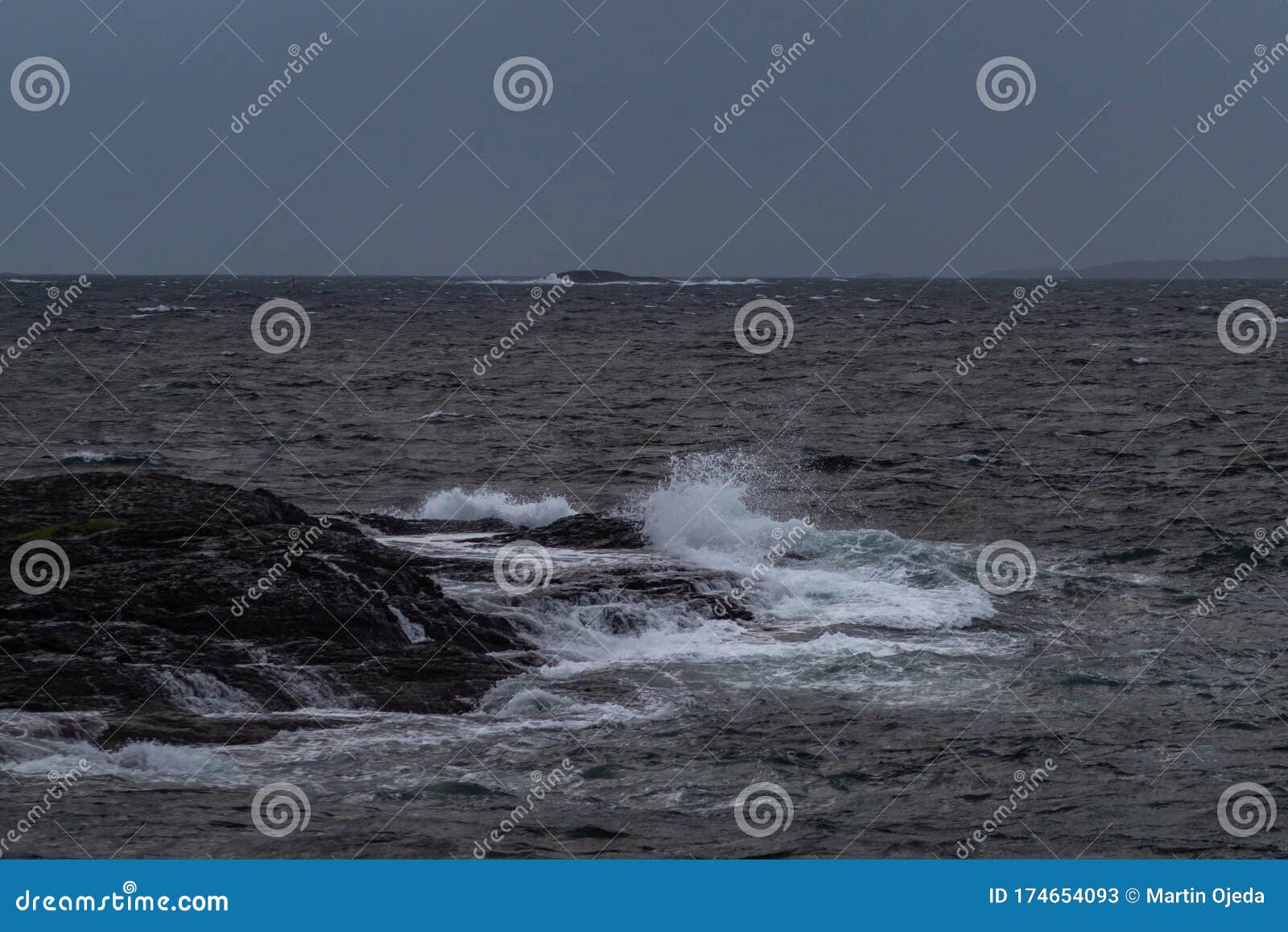 Small Waves Hitting Dark Rocks from the Ocean Stock Image - Image of ...