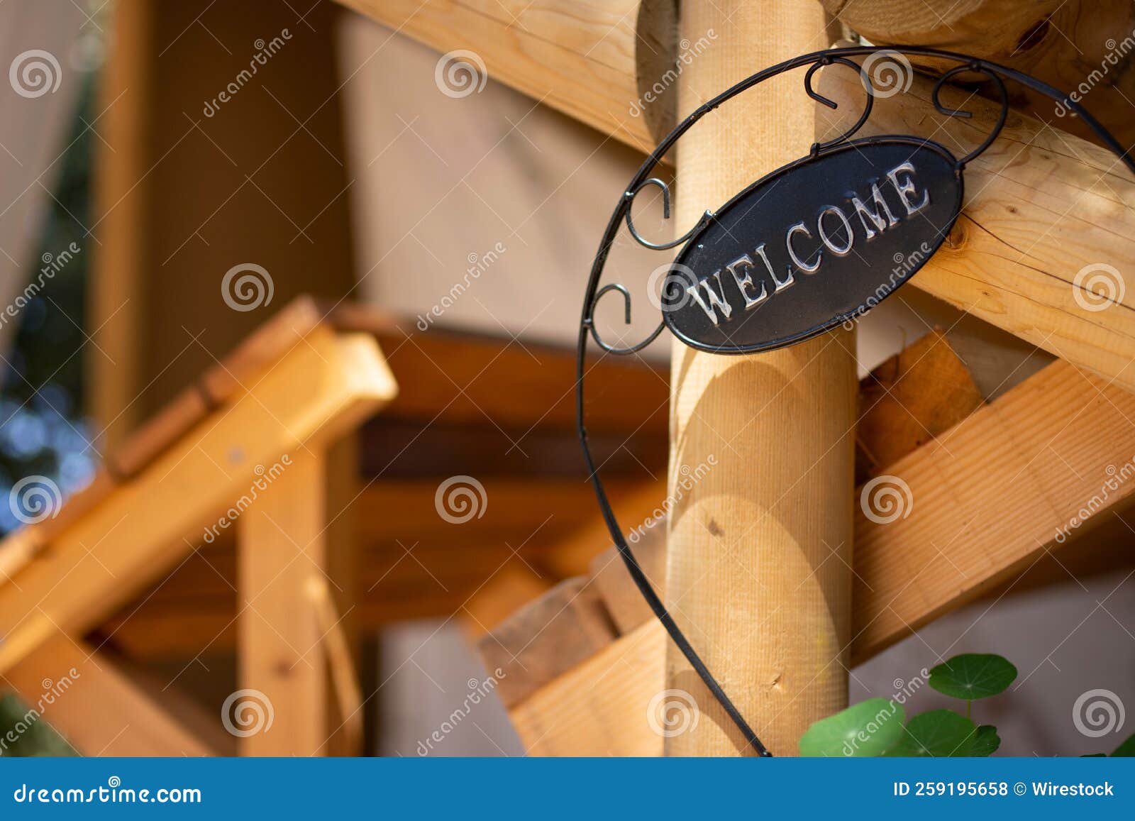 Small Welcome Sign on the Wooden Construction Stock Photo - Image of ...