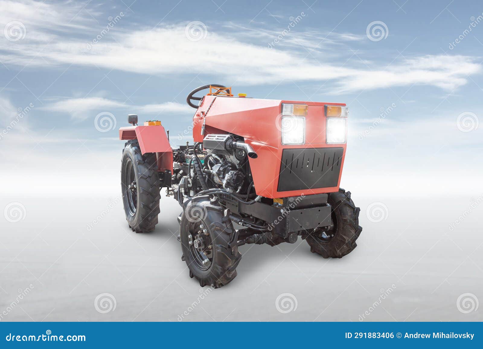 Small Wheeled Tractor Isolated on Bright Background with Sky Stock ...